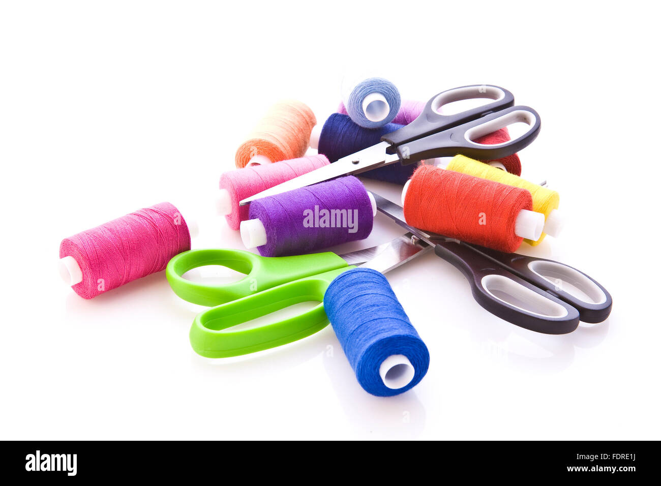 Sewing equipment on a white background Stock Photo - Alamy