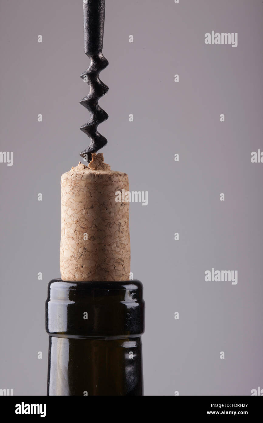 neck of a wine bottle old cork and corkscrew Stock Photo - Alamy