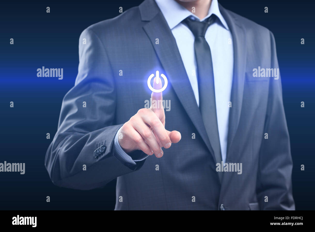 Businessman pressing power button concept Stock Photo - Alamy