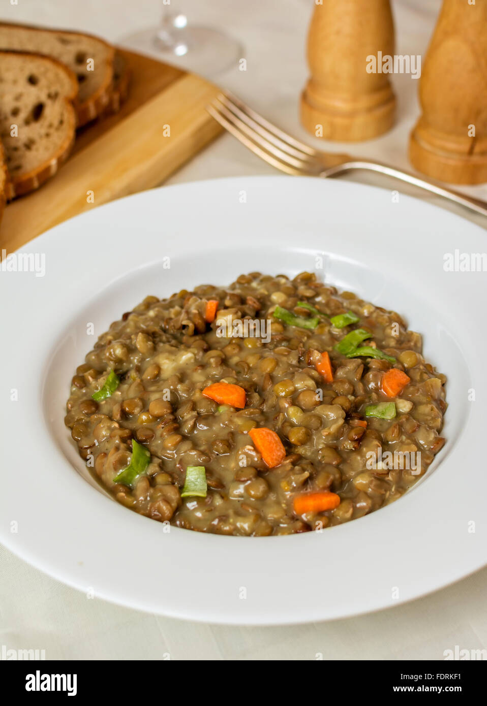 Traditional lentils or lens with vegetables and bread Stock Photo - Alamy