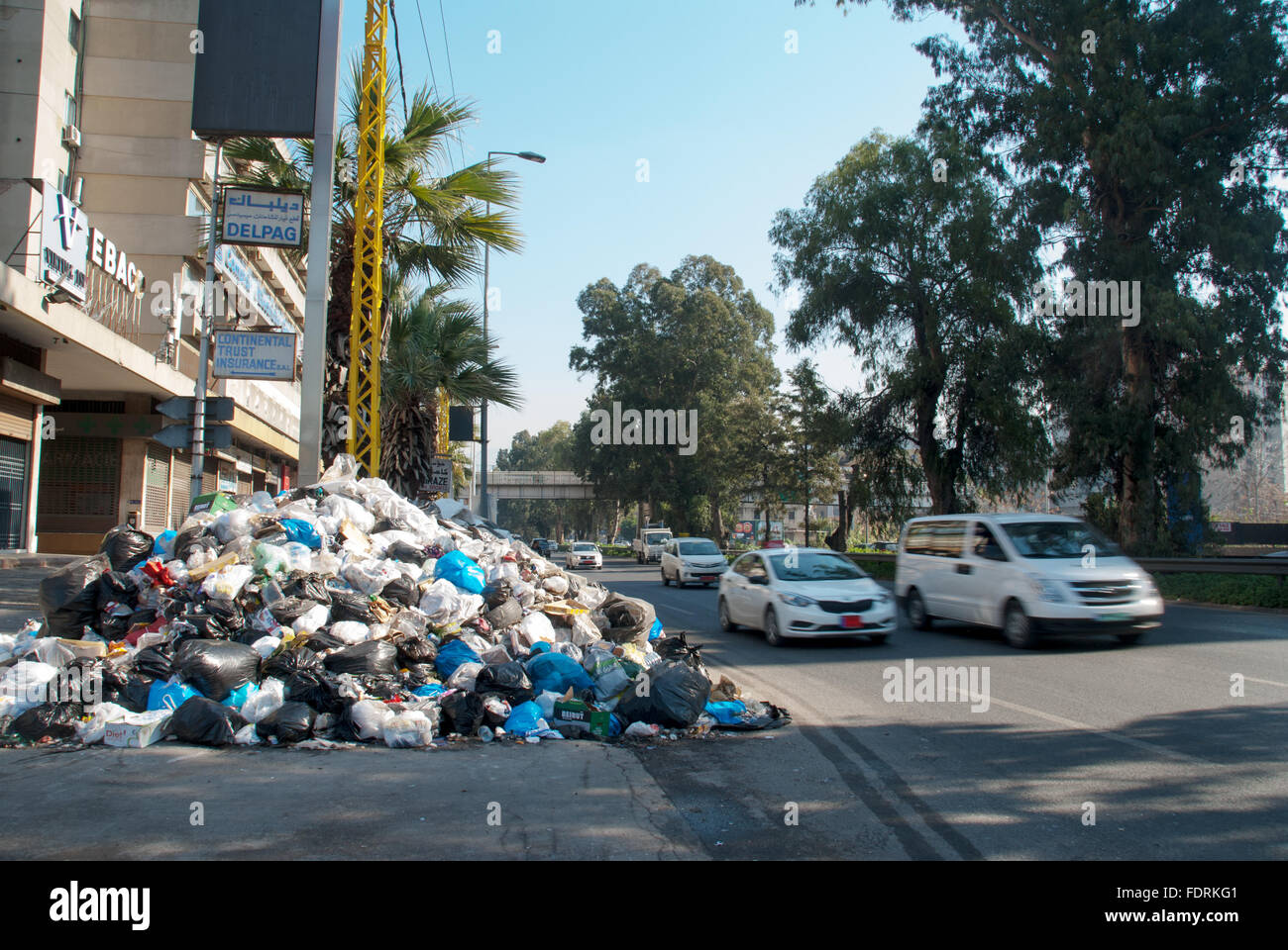 trash piles in the street of Beirut Lebanon Stock Photo - Alamy