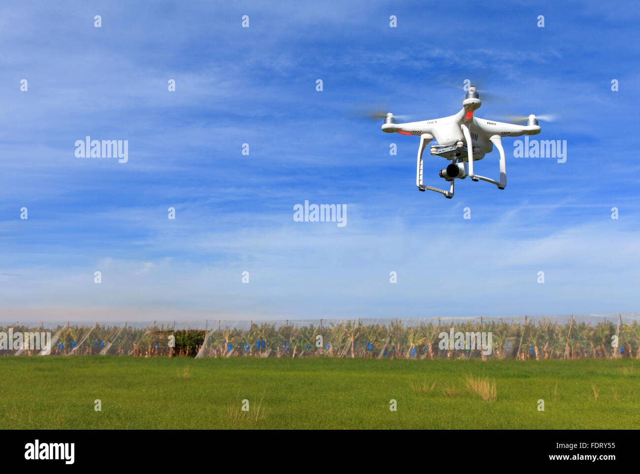 White drone equipped with high resolution 4K video camera Stock Photo ...
