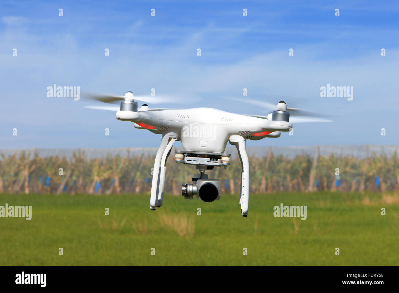 White drone equipped with high resolution 4K video camera Stock Photo ...