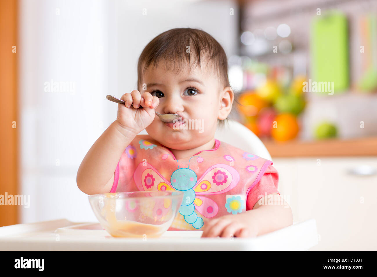 Eating with spoon hi-res stock photography and images - Alamy