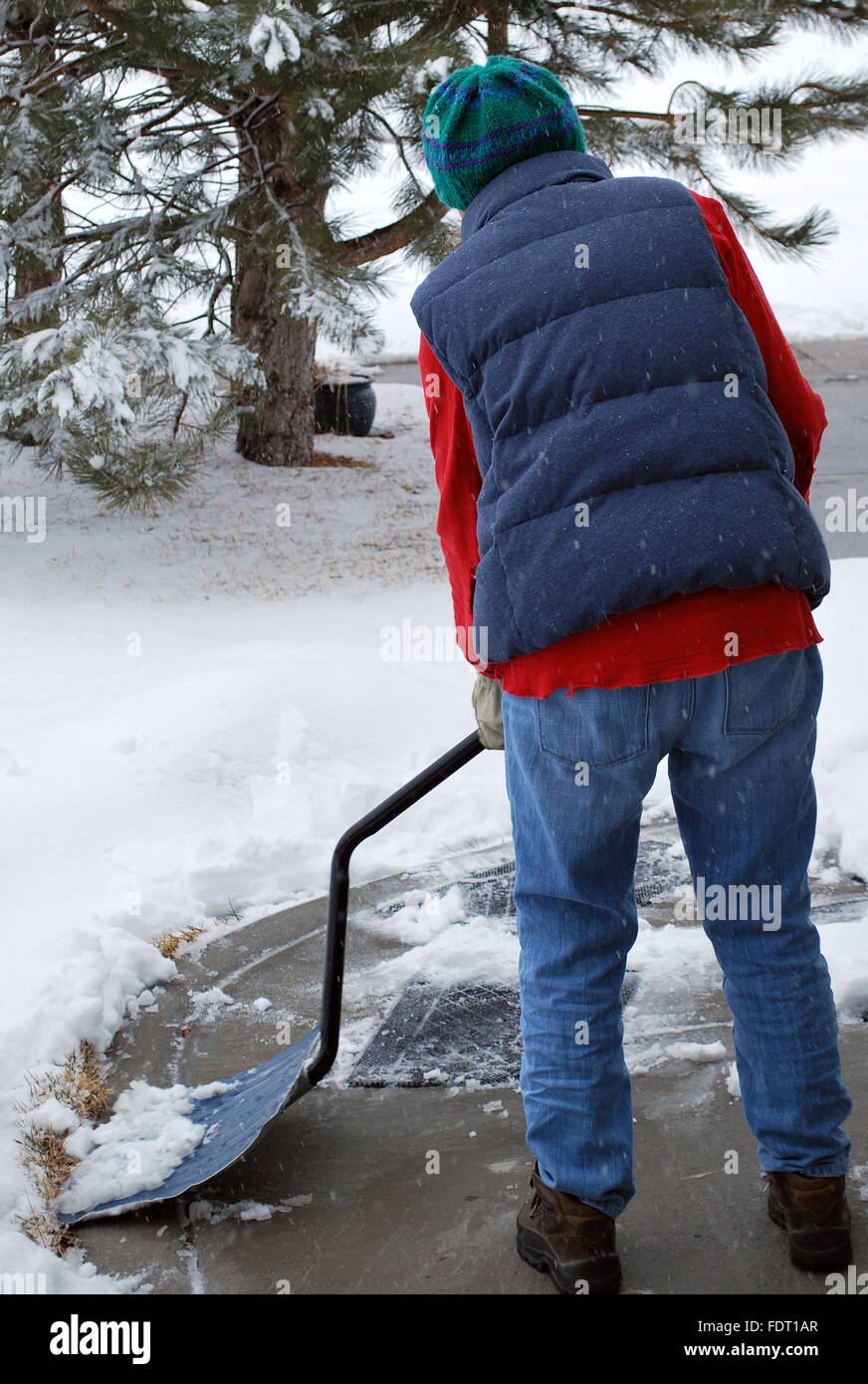 Woman Shoveling Snow High Resolution Stock Photography and Images - Alamy