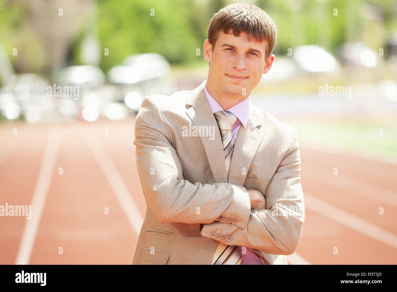 Businessman sport manager and executive at athletic stadium and race ...