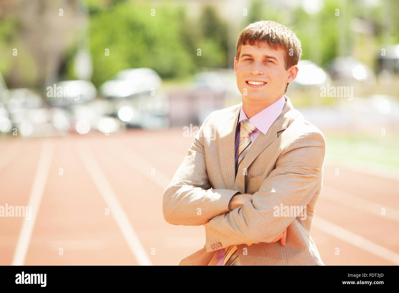 Businessman sport manager and executive at athletic stadium and race ...