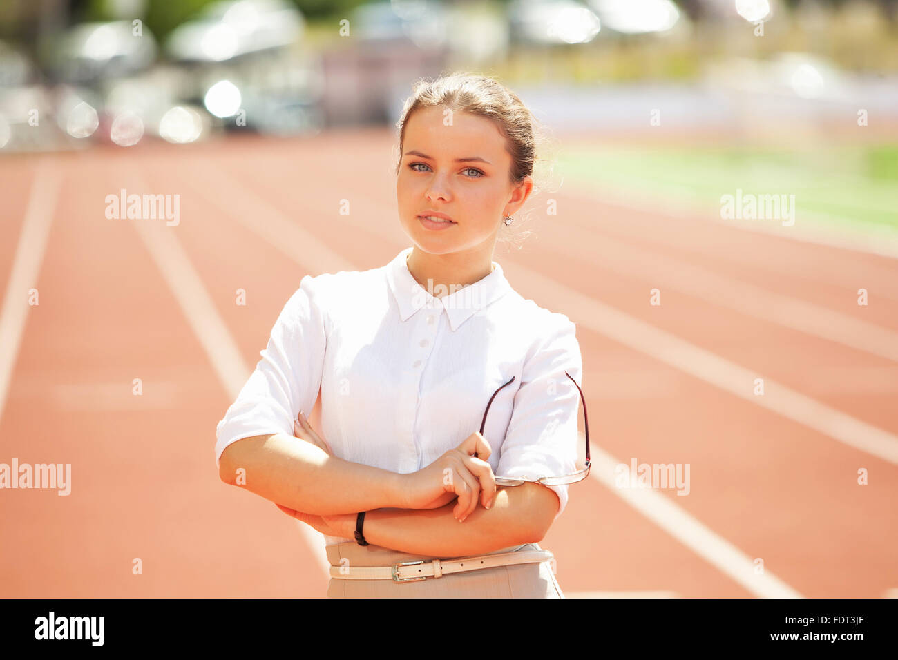 Businesswoman sport manager and executive at athletic stadium and race ...