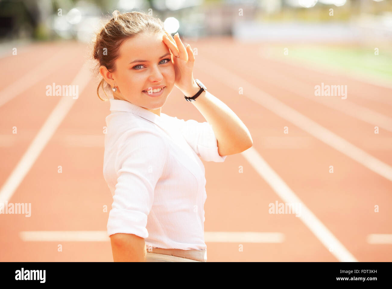 Businesswoman sport manager and executive at athletic stadium and race ...