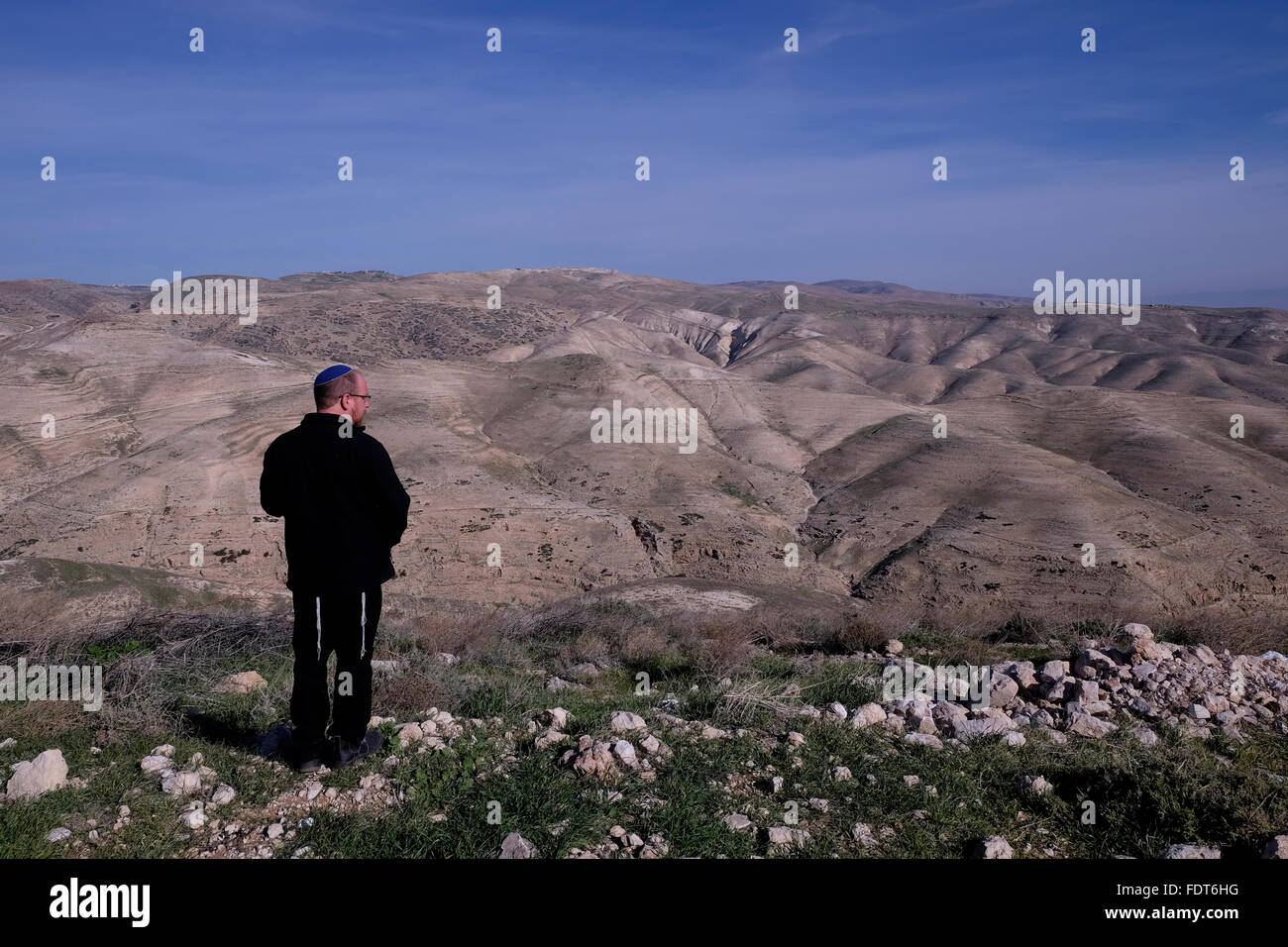A religious Jewish settler gazing at the Wadi Kelt a popular hiking ...