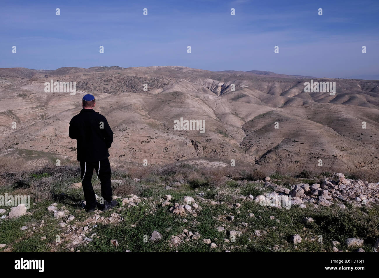 A religious Jewish settler gazing at the Wadi Kelt a popular hiking ...