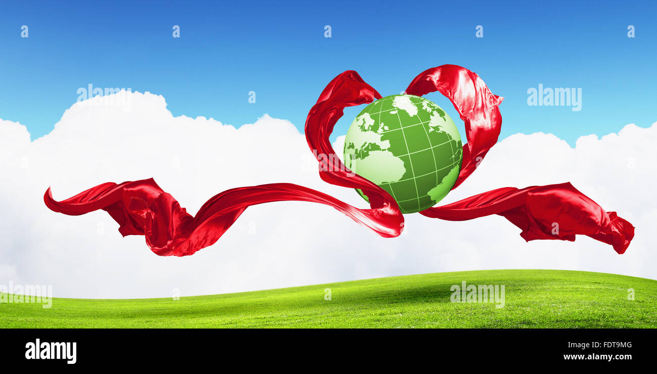 World within the heart symbol on blue sky background Stock Photo - Alamy