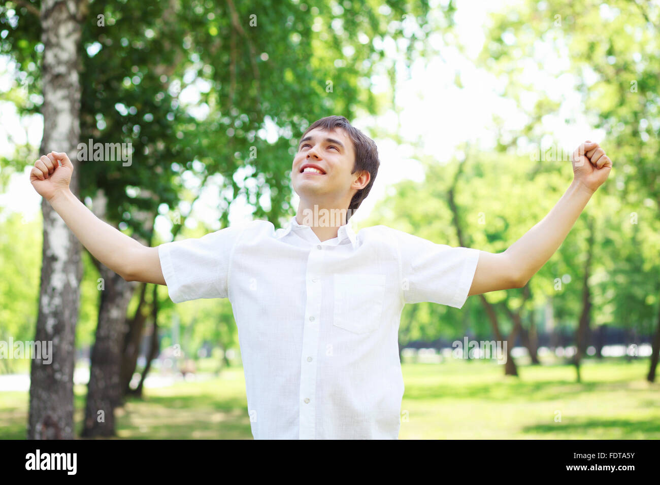 Handsome young man in the park. Outdoor portrait Stock Photo - Alamy