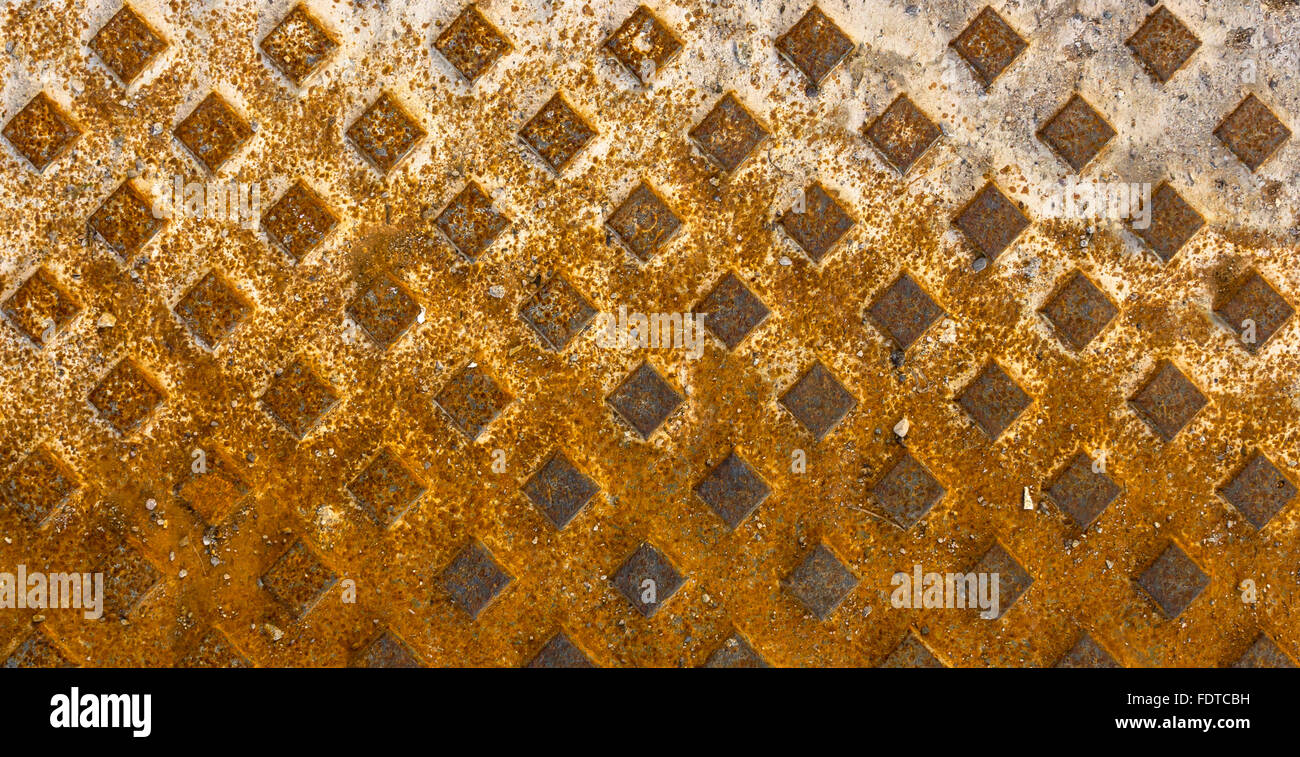 Close-up of manhole cover of steel with rust as background Stock Photo ...