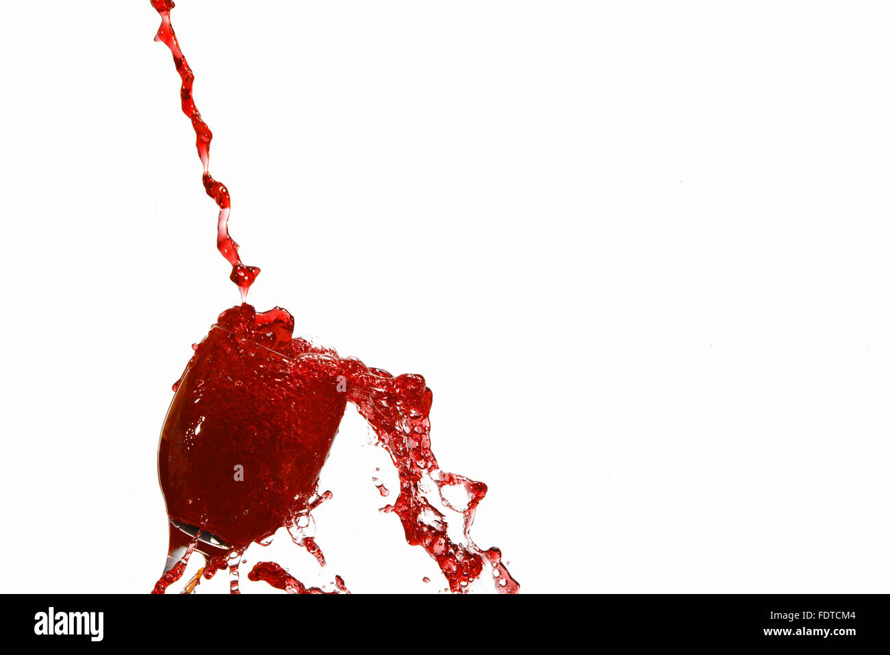 Juice splash isolated on white Stock Photo - Alamy