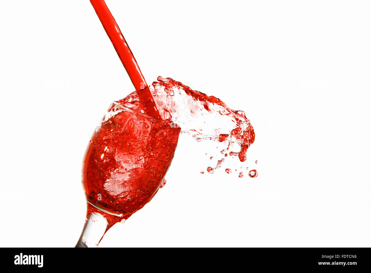 Juice splash isolated on white Stock Photo - Alamy