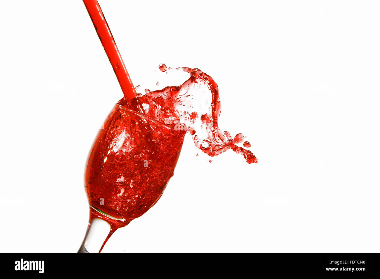 Juice splash isolated on white Stock Photo - Alamy