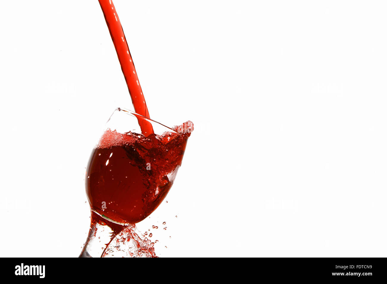 Juice splash isolated on white Stock Photo - Alamy