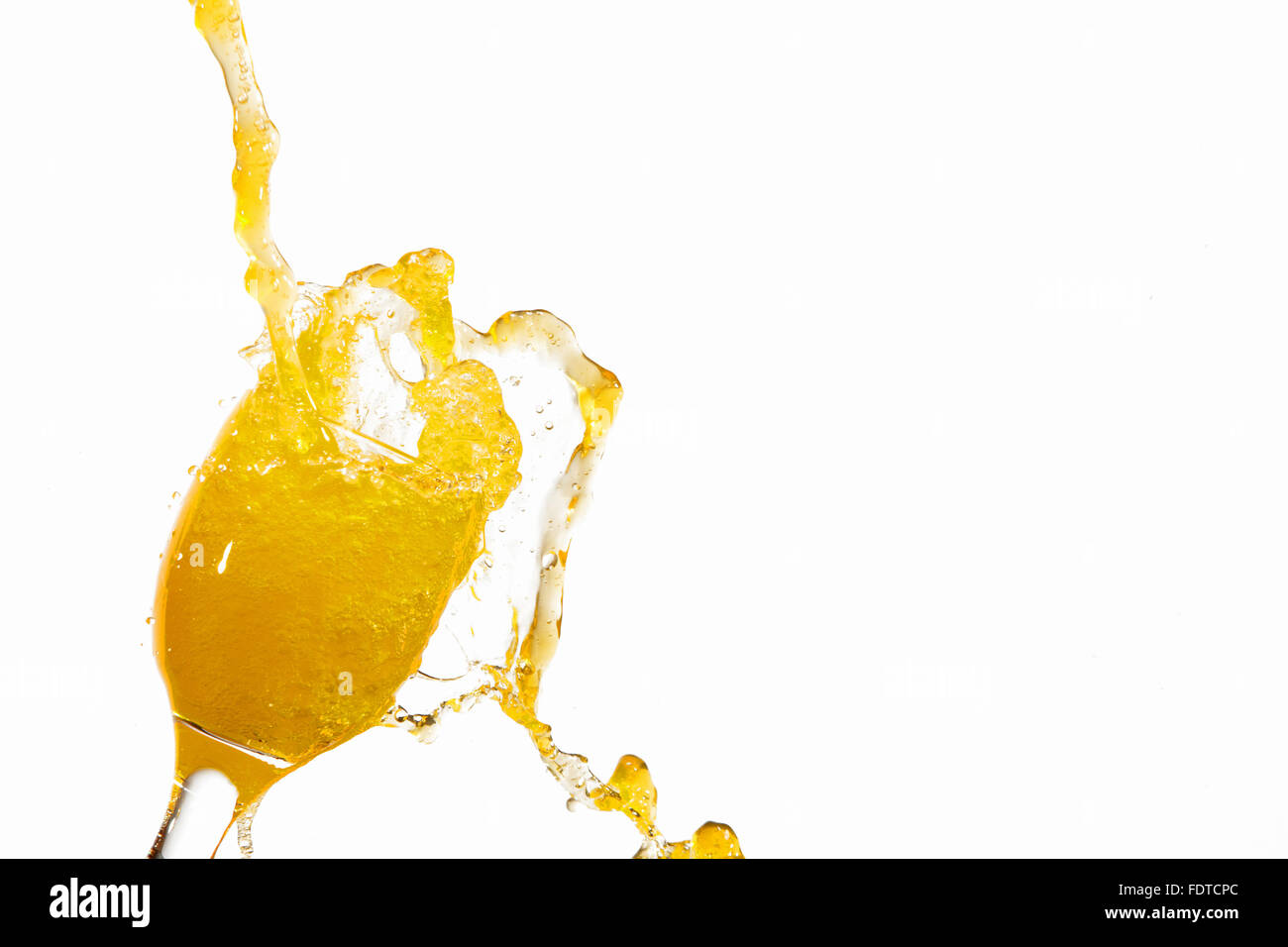 Juice splash isolated on white Stock Photo - Alamy