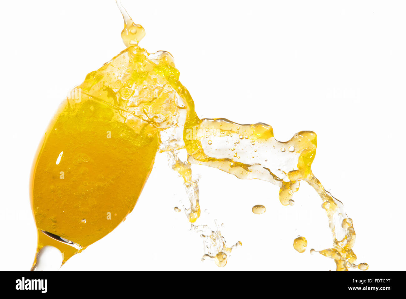 Juice splash isolated on white Stock Photo - Alamy