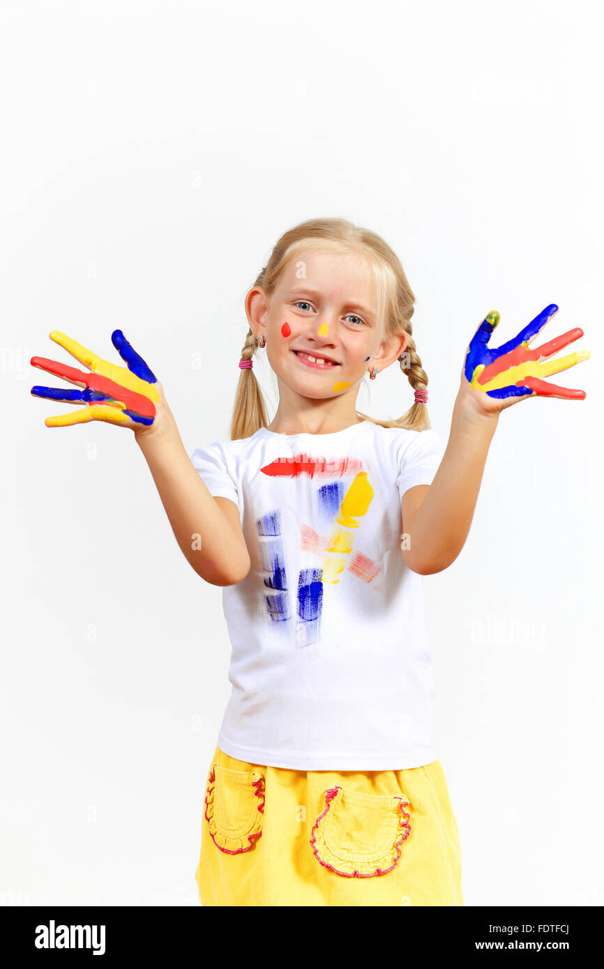 little child with hands painted in colorful paints ready for hand ...