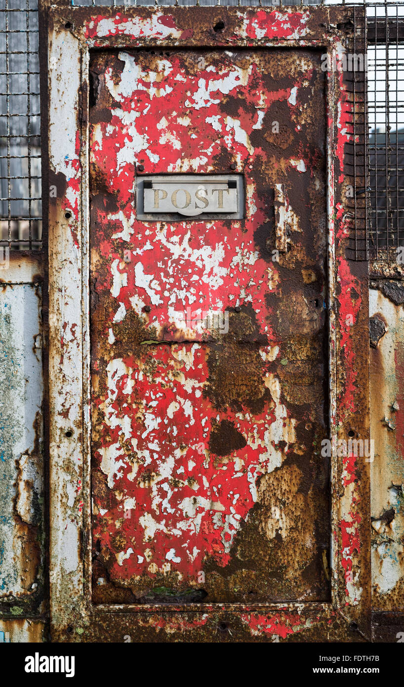An old, rusty metal door and letterbox Stock Photo - Alamy
