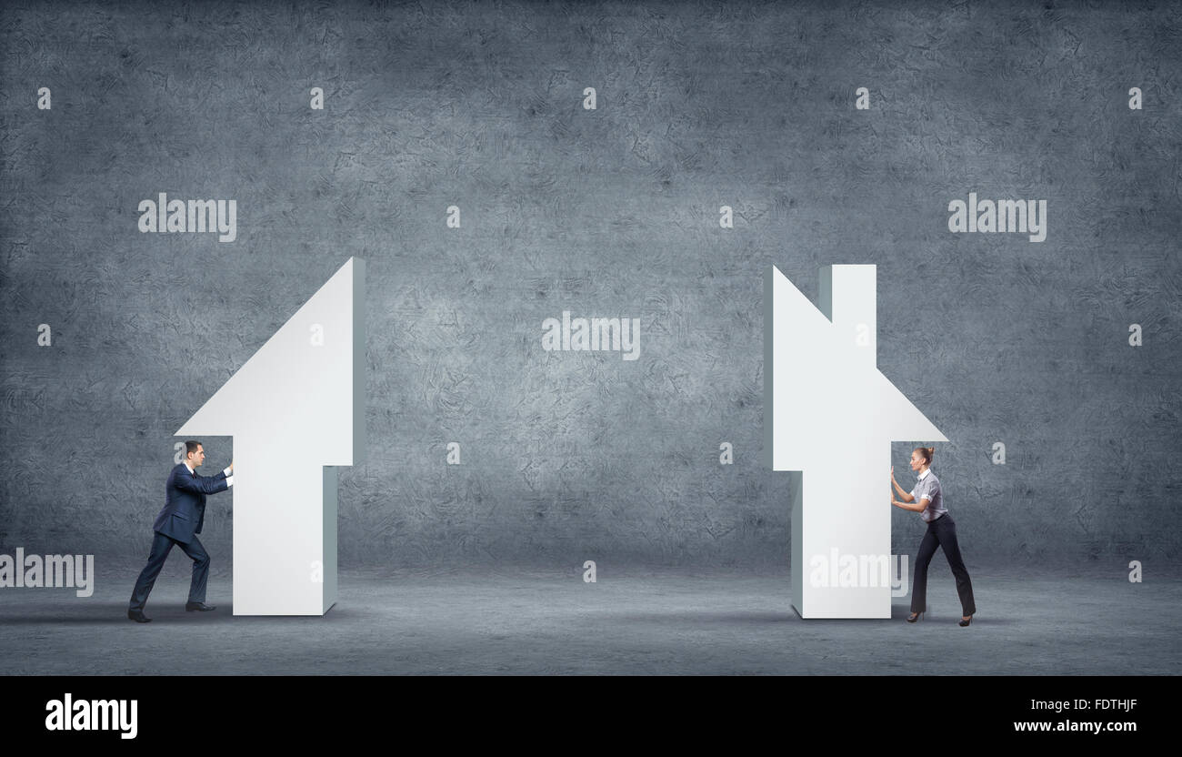 Business person with piece of puzzle ( jigsaw ) building a house Stock ...