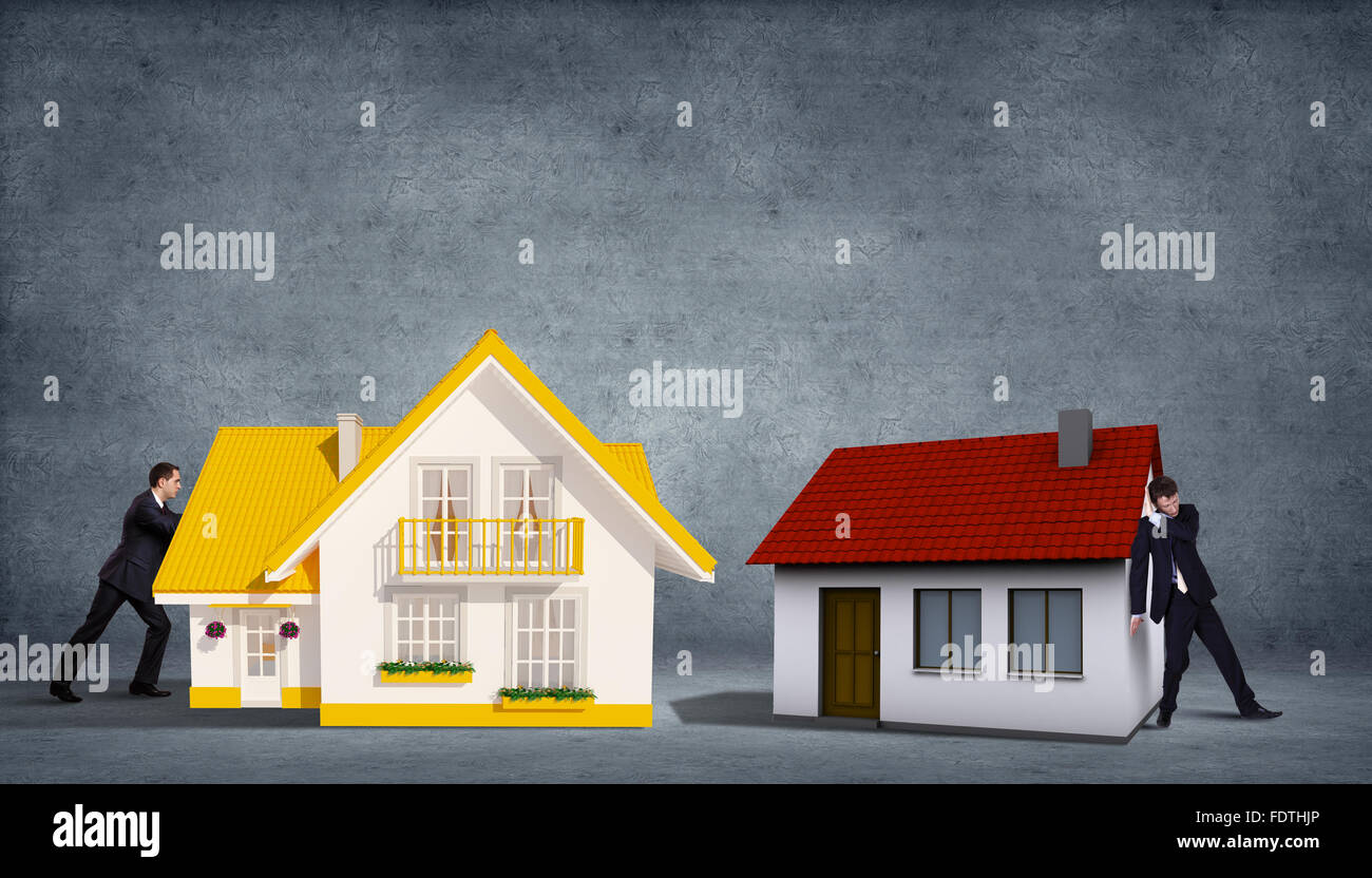 Business person with piece of puzzle ( jigsaw ) building a house Stock ...