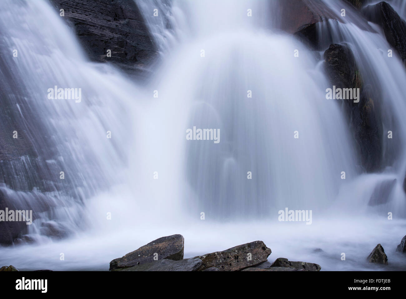 Waterfall cascading over rocks in Snowdonia Stock Photo - Alamy