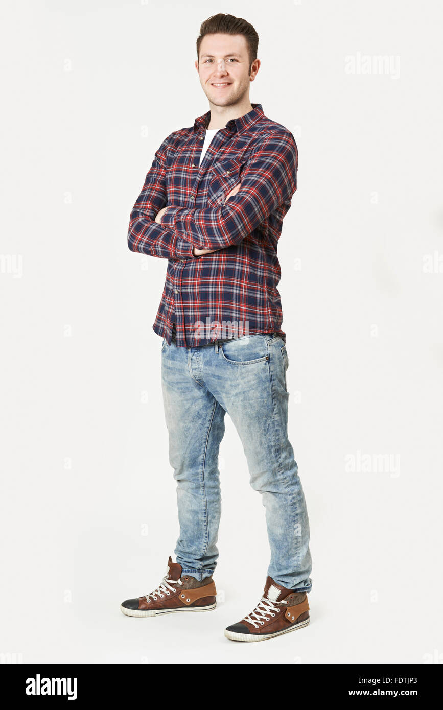 Full Length Portrait Of Man Standing In Studio On White Background ...