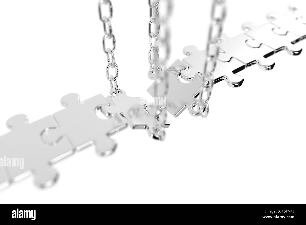 Metal chrome jigsaw puzzle successful bridge connection with chain over ...