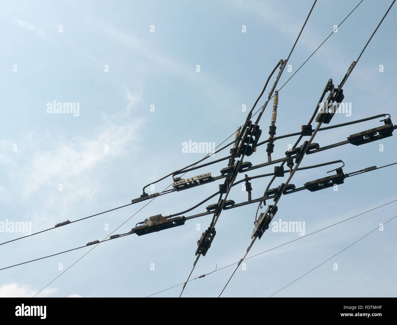 tramway network wire crossing on sky background Stock Photo - Alamy