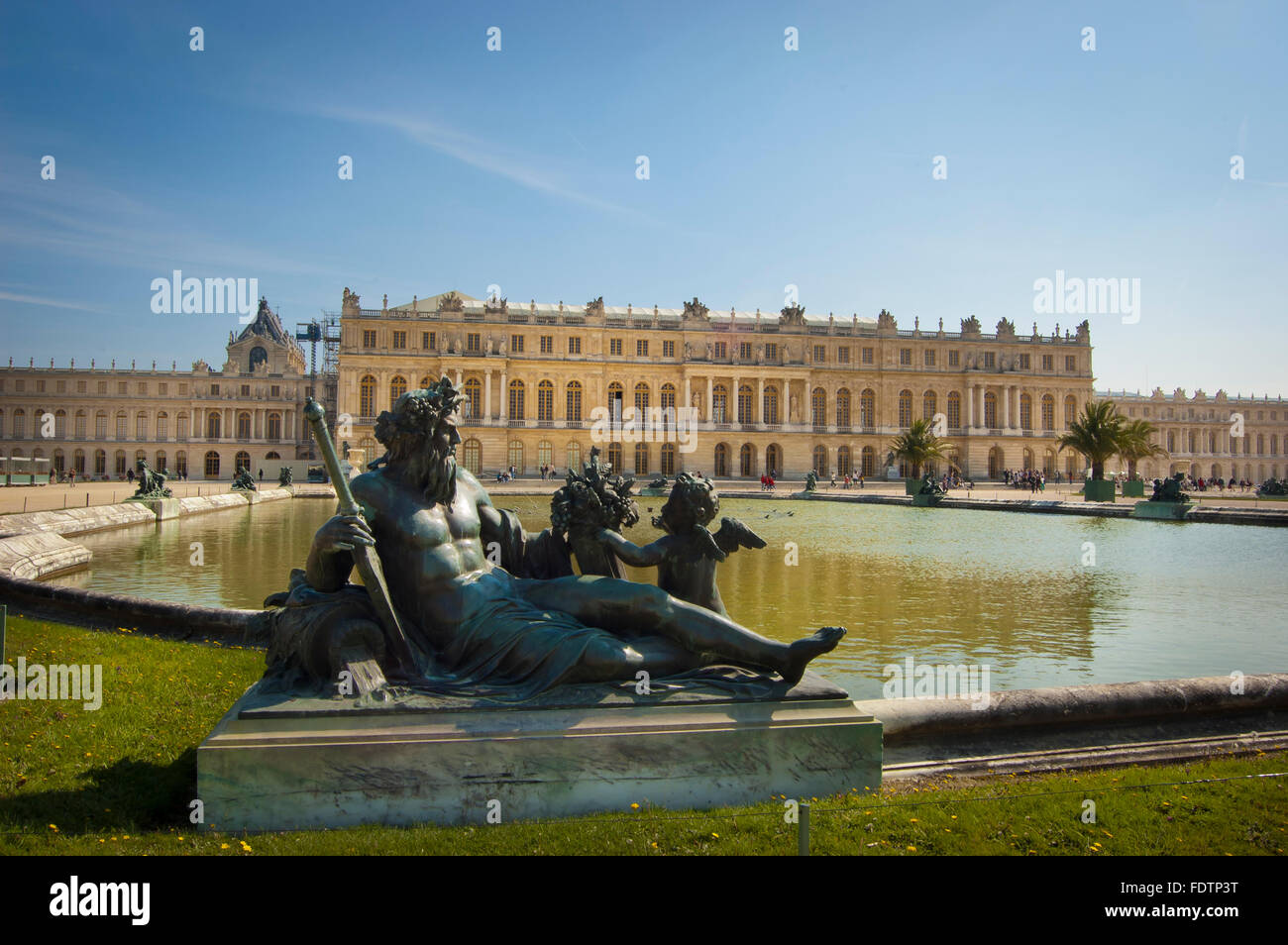 Bronze Sculpture at Fountain's Edge in Garden at Chateau de Versailles ...