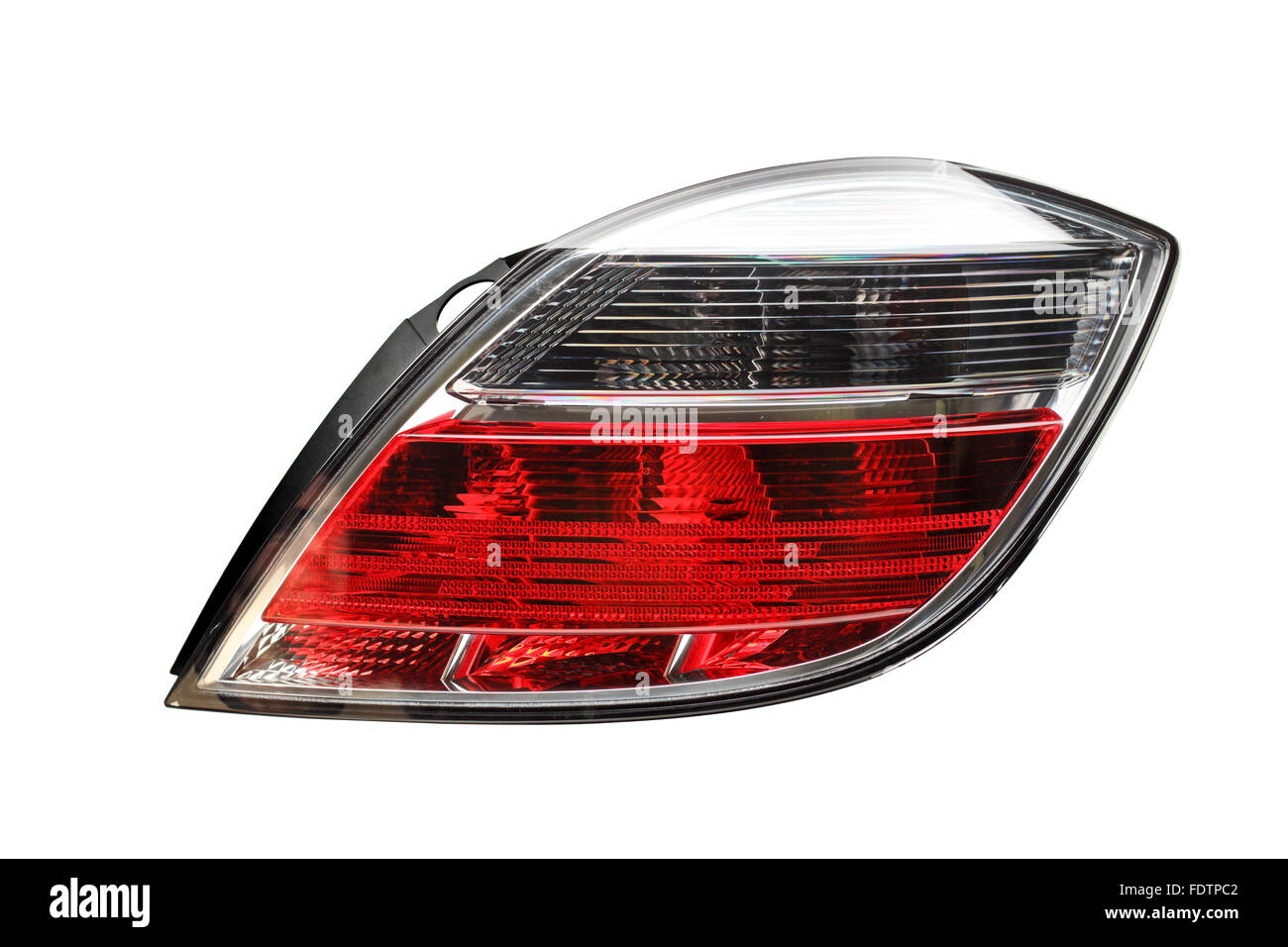 Close-up on an isolated generic rear light of a car on white background ...