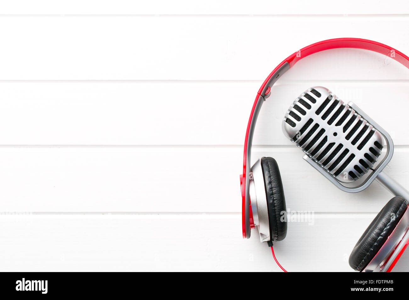 the vintage silver microphone and headphones Stock Photo - Alamy