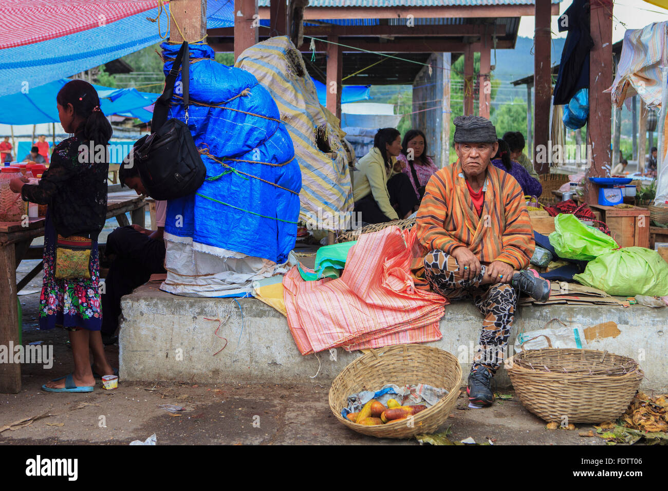A vendor in the main market of Paro, Bhutan Stock Photo - Alamy