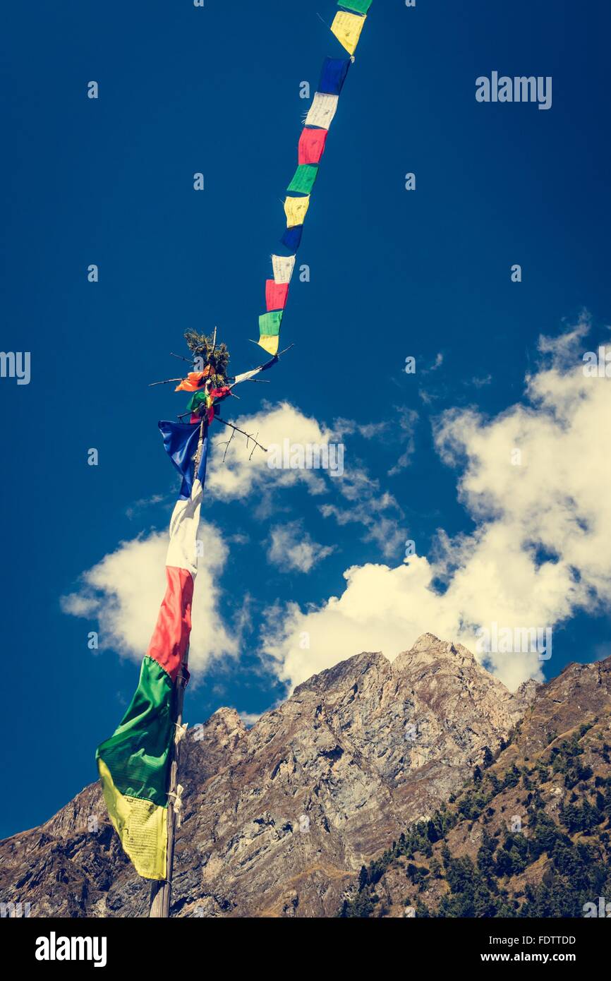 Prayer flags on a pole Stock Photo - Alamy