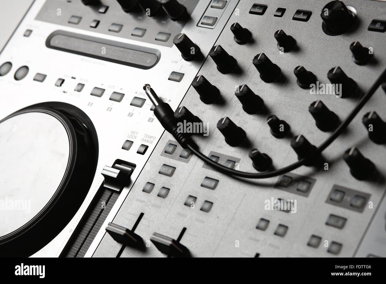Dj mixer equipment to control sound and play music Stock Photo - Alamy