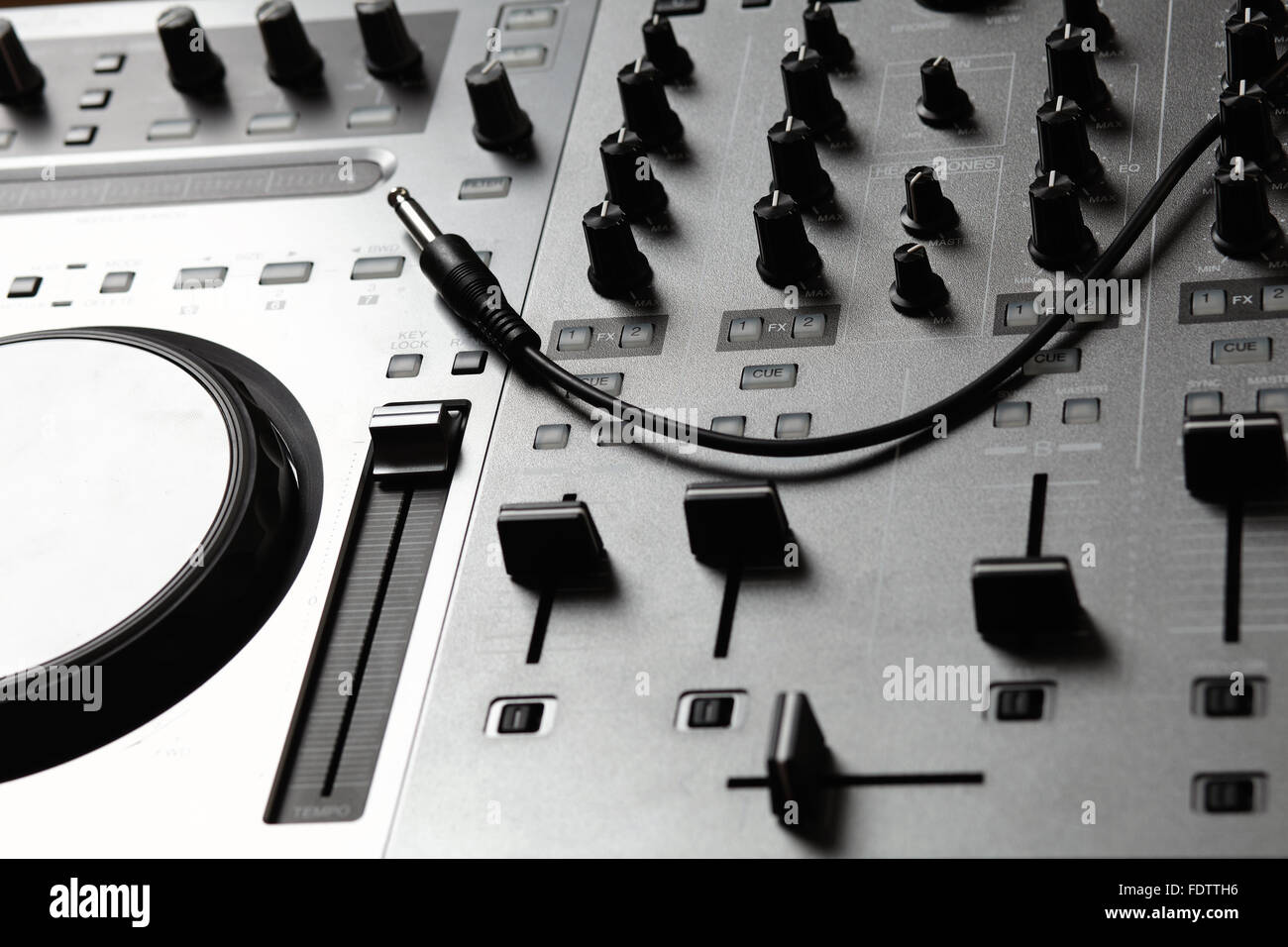 Dj mixer equipment to control sound and play music Stock Photo - Alamy