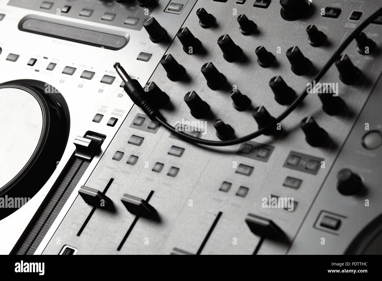 Dj mixer equipment to control sound and play music Stock Photo - Alamy