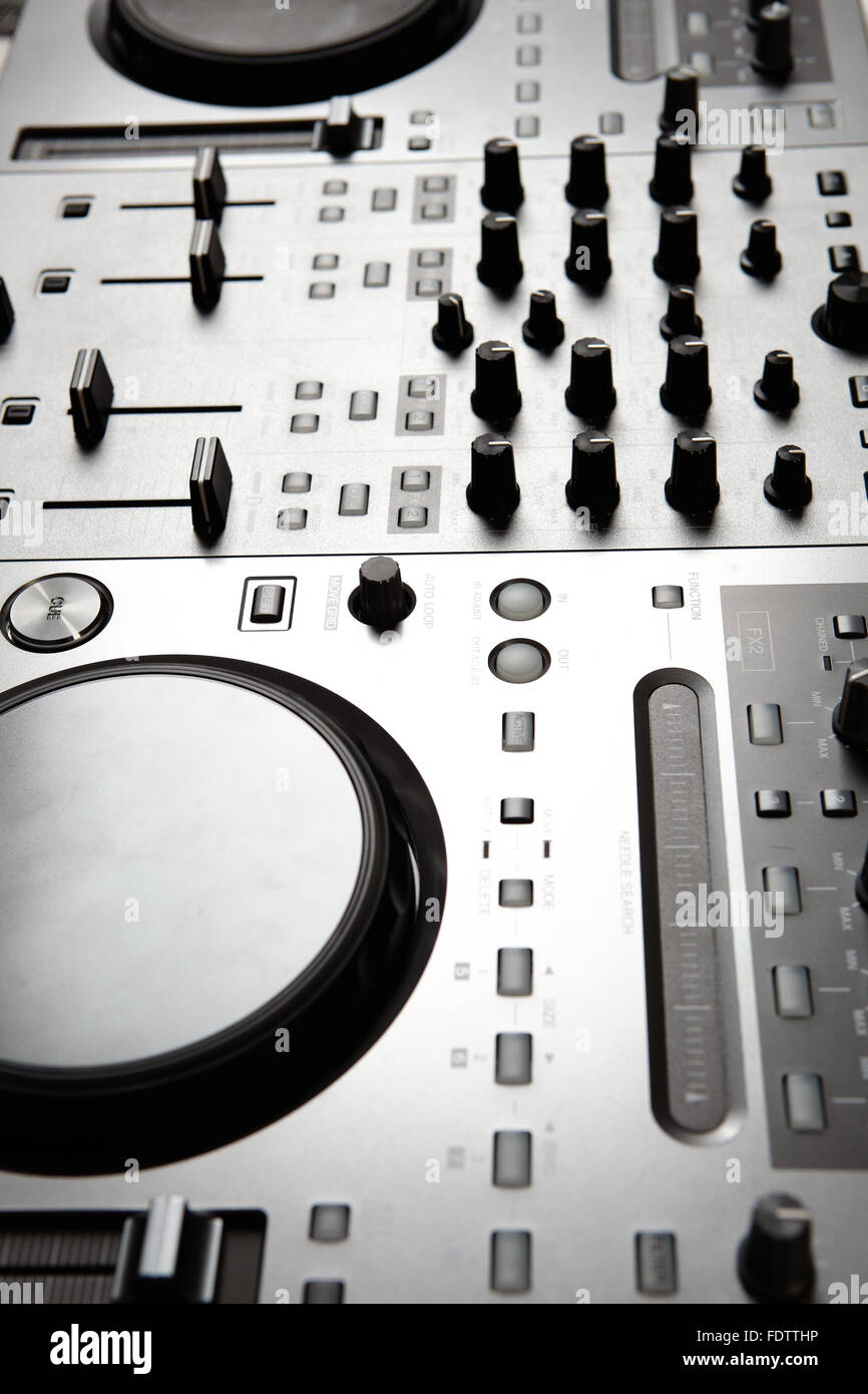 Dj mixer equipment to control sound and play music Stock Photo - Alamy