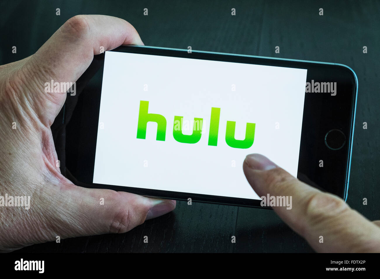 Hulu online movie streaming service logo on screen of smart phone Stock ...