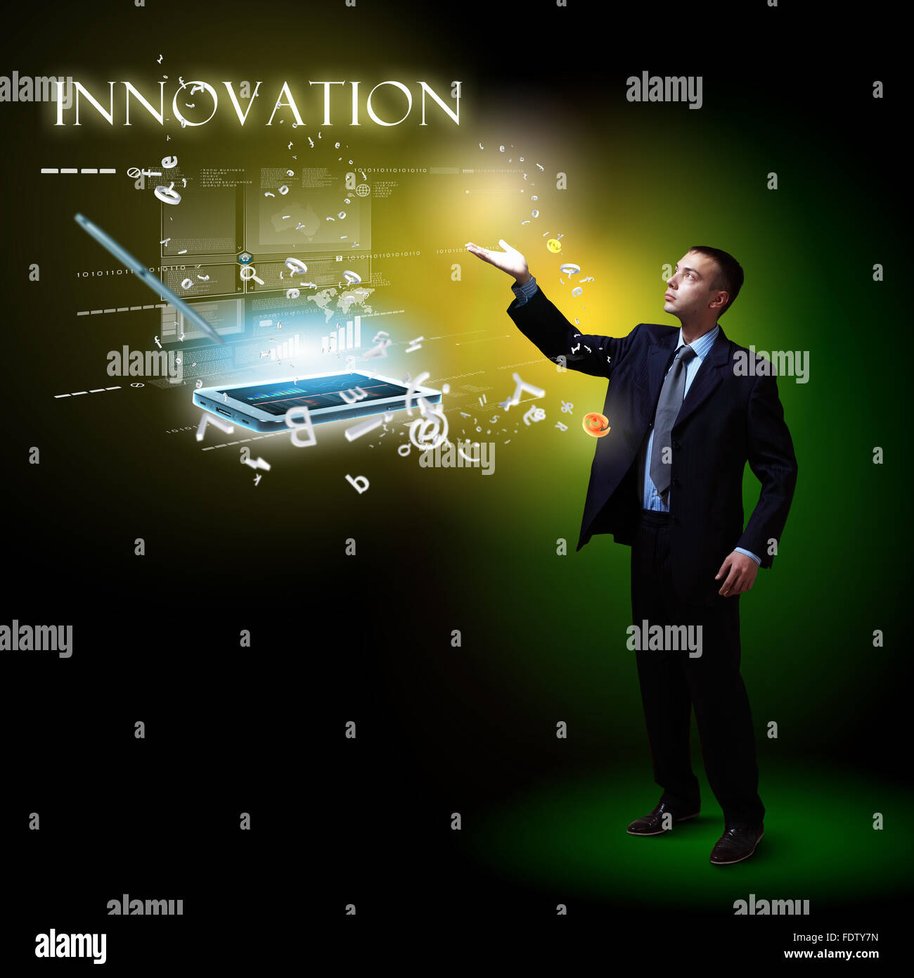 Businessman standing with modern technology symbols next to him Stock ...