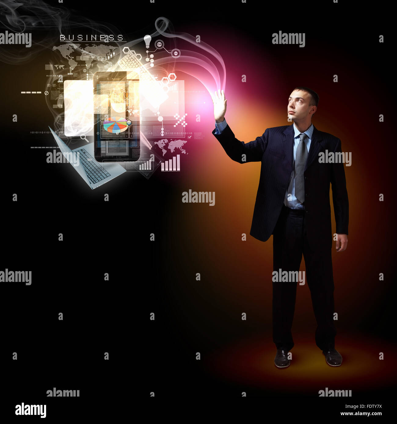 Businessman standing with modern technology symbols next to him Stock ...