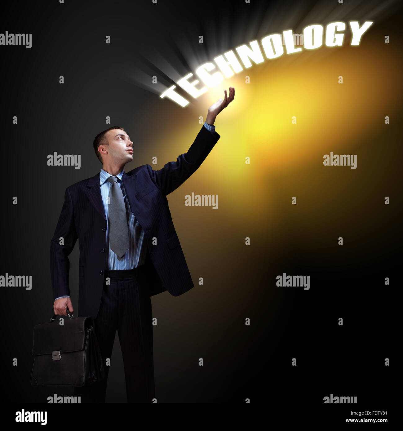 Businessman standing with modern technology symbols next to him Stock ...