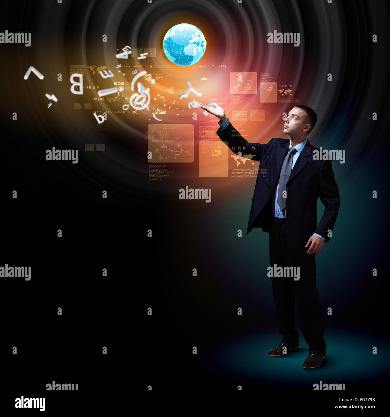 Businessman standing with modern technology symbols next to him Stock ...