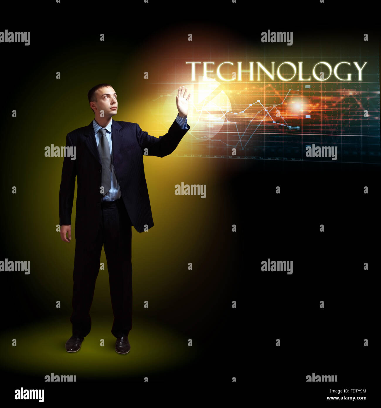 Businessman standing with modern technology symbols next to him Stock ...