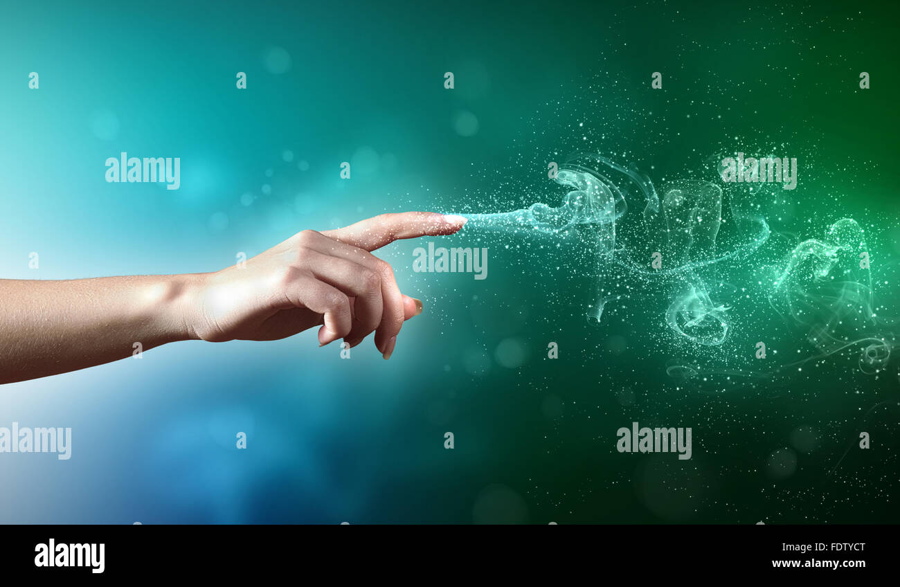 magical hand conceptual image with sparkles on colour background Stock ...