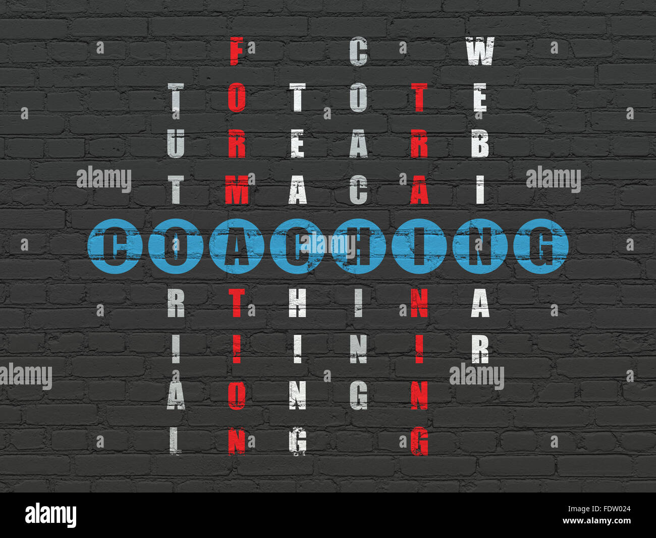 Education concept: Coaching in Crossword Puzzle Stock Photo - Alamy