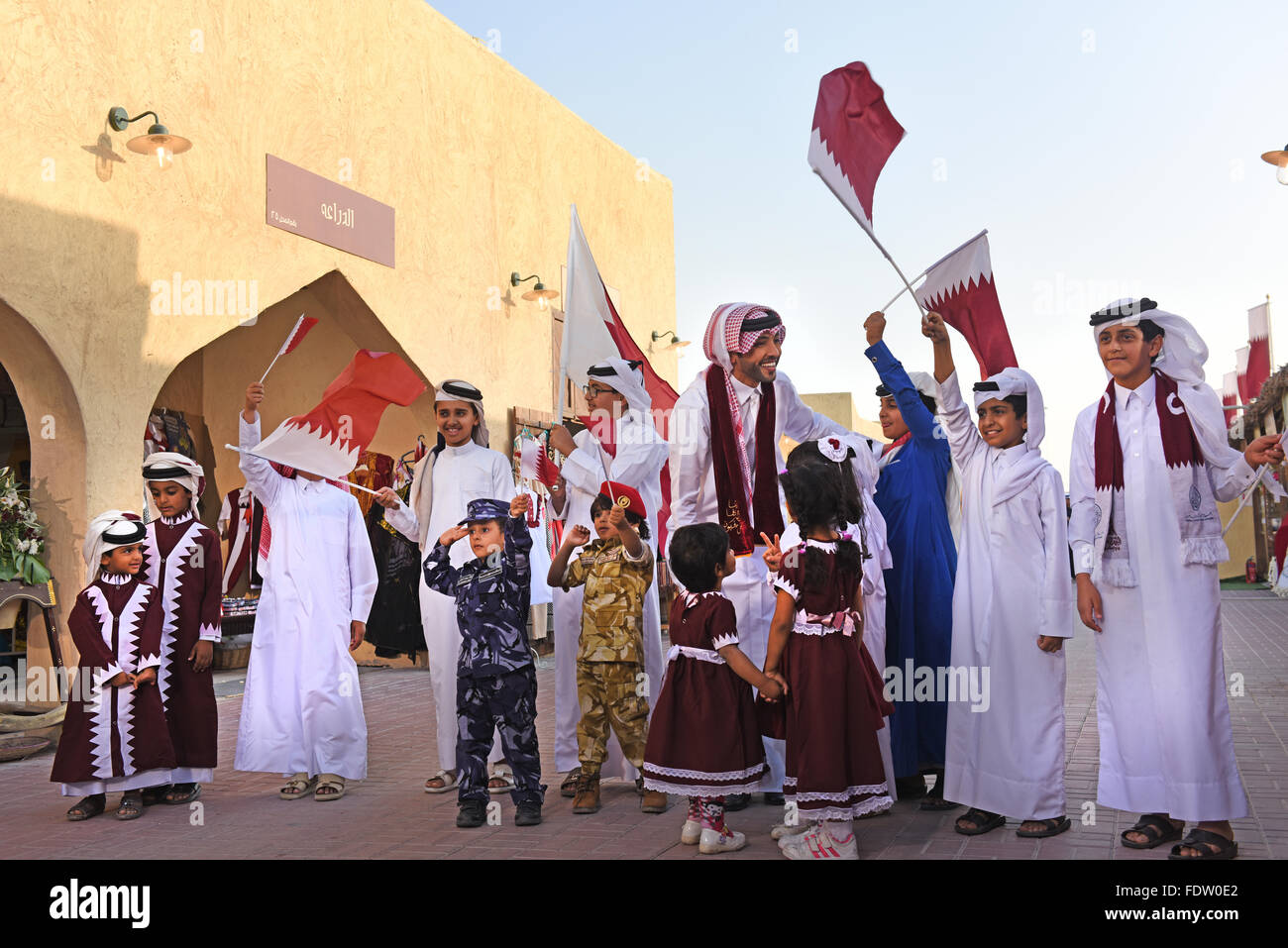 Qatari family celebrating national day Stock Photo - Alamy